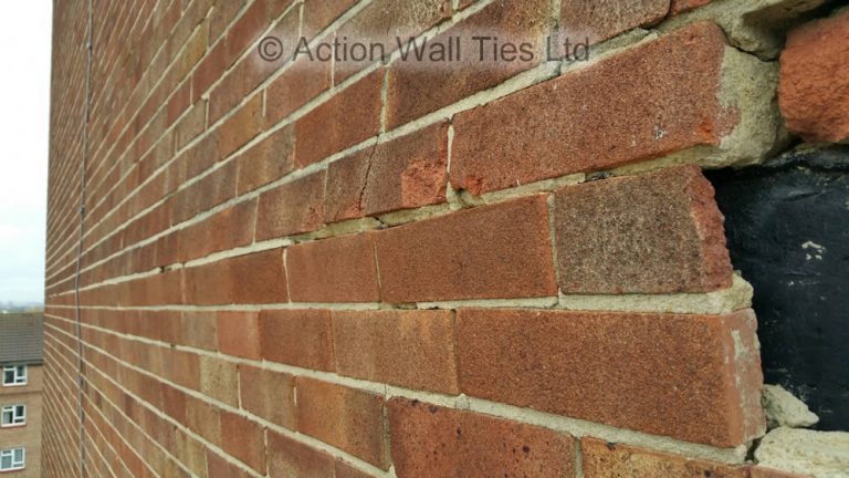 Bowing brick slip & wall tie repairs to SW London blocks of flats.